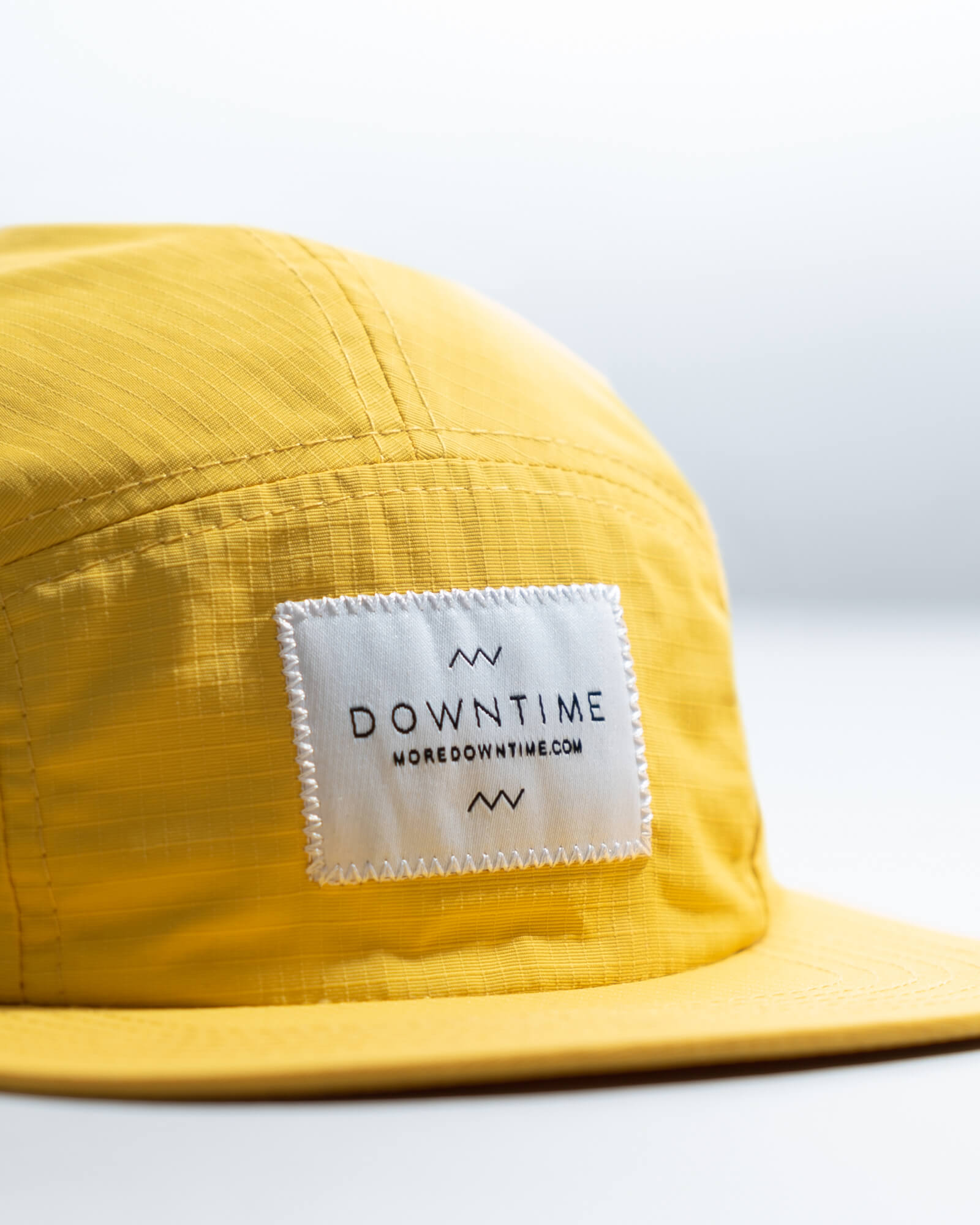 Woven Label with Zig Zag Stitch – REACH MFG | Custom Hats